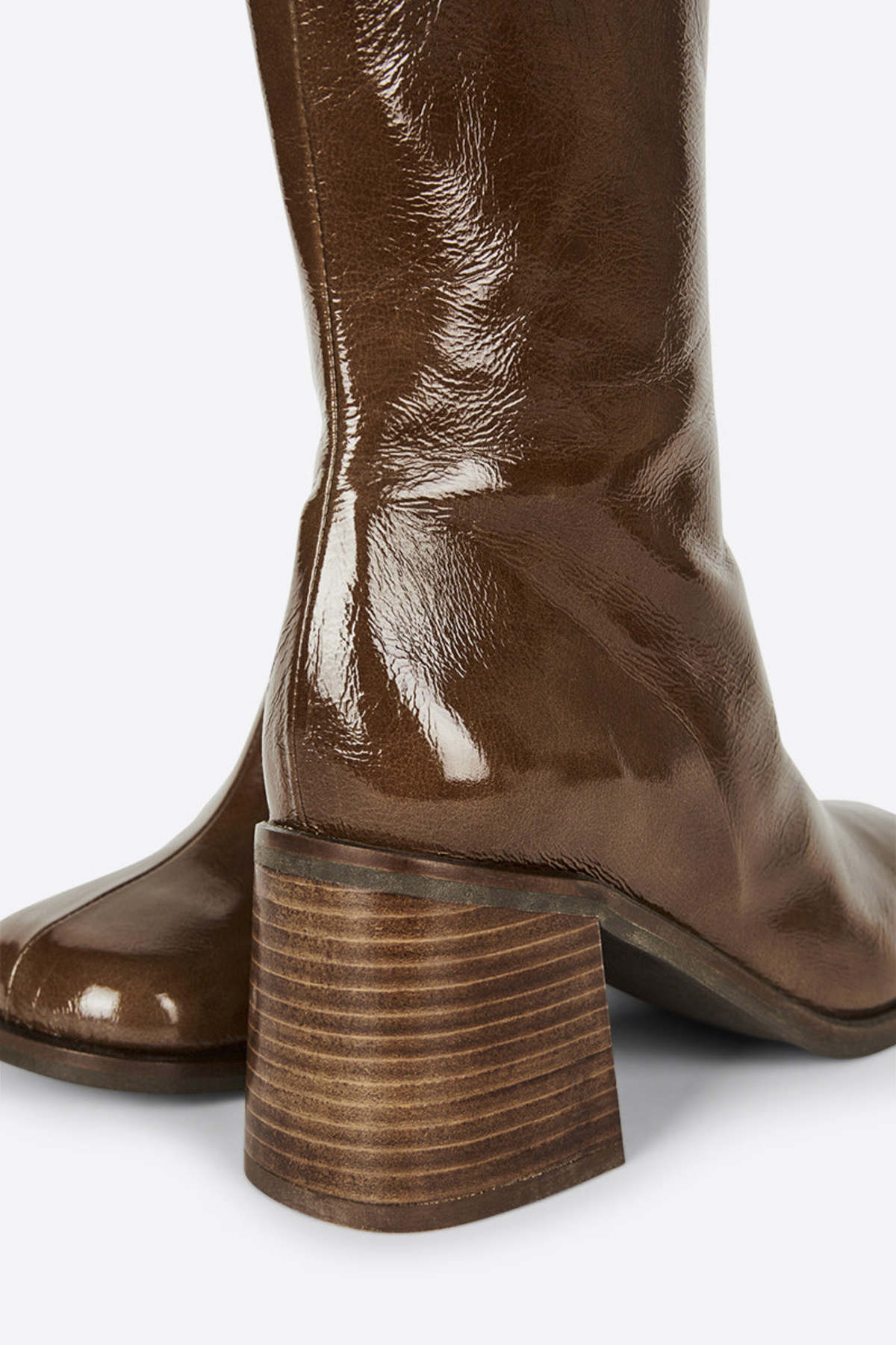 "INTENTIONALLY __________." Mall Tall Heeled Boot | Garmentory
