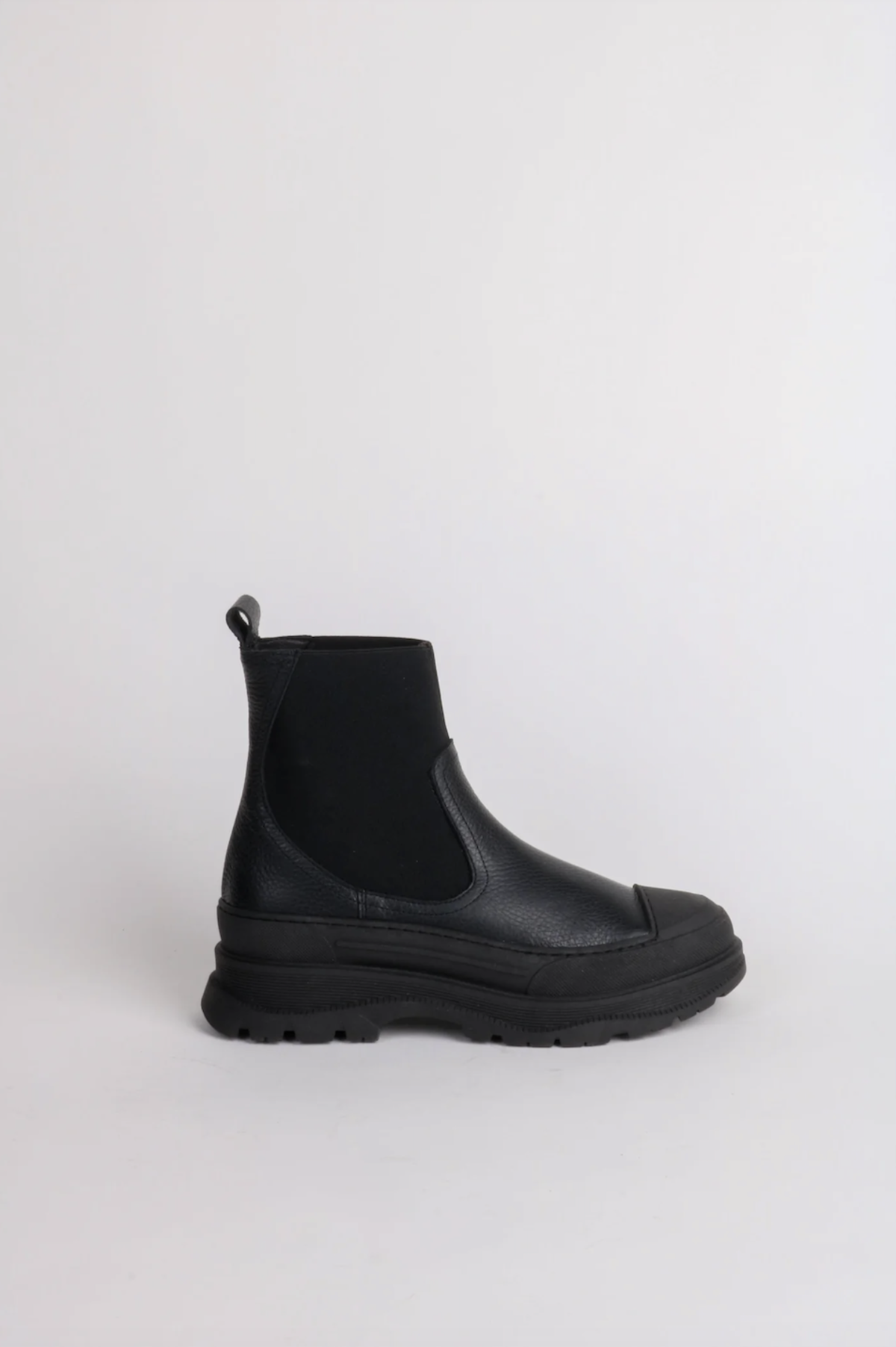 "INTENTIONALLY __________." Blank Court Lug Sole Boot - Black | Garmentory