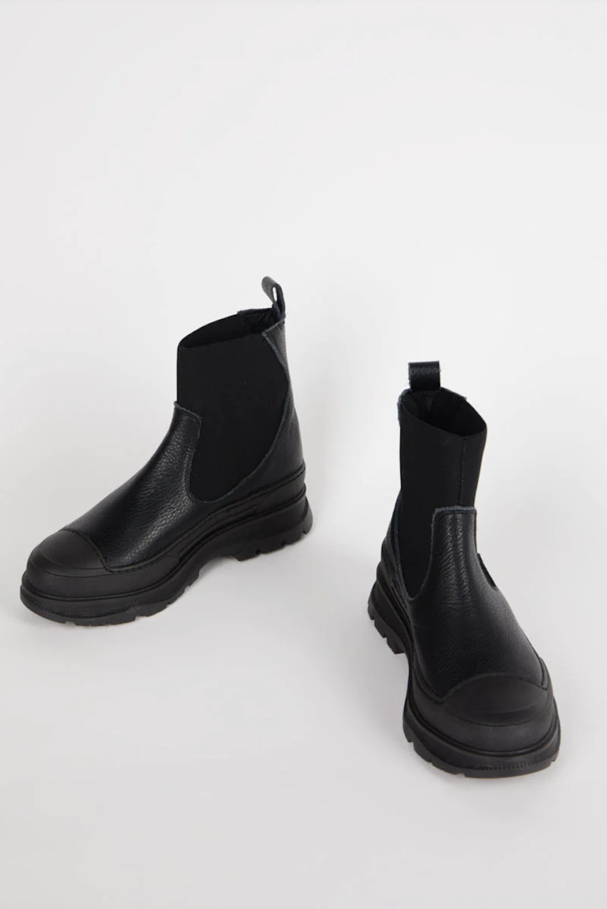 "INTENTIONALLY __________." Blank Court Lug Sole Boot - Black | Garmentory